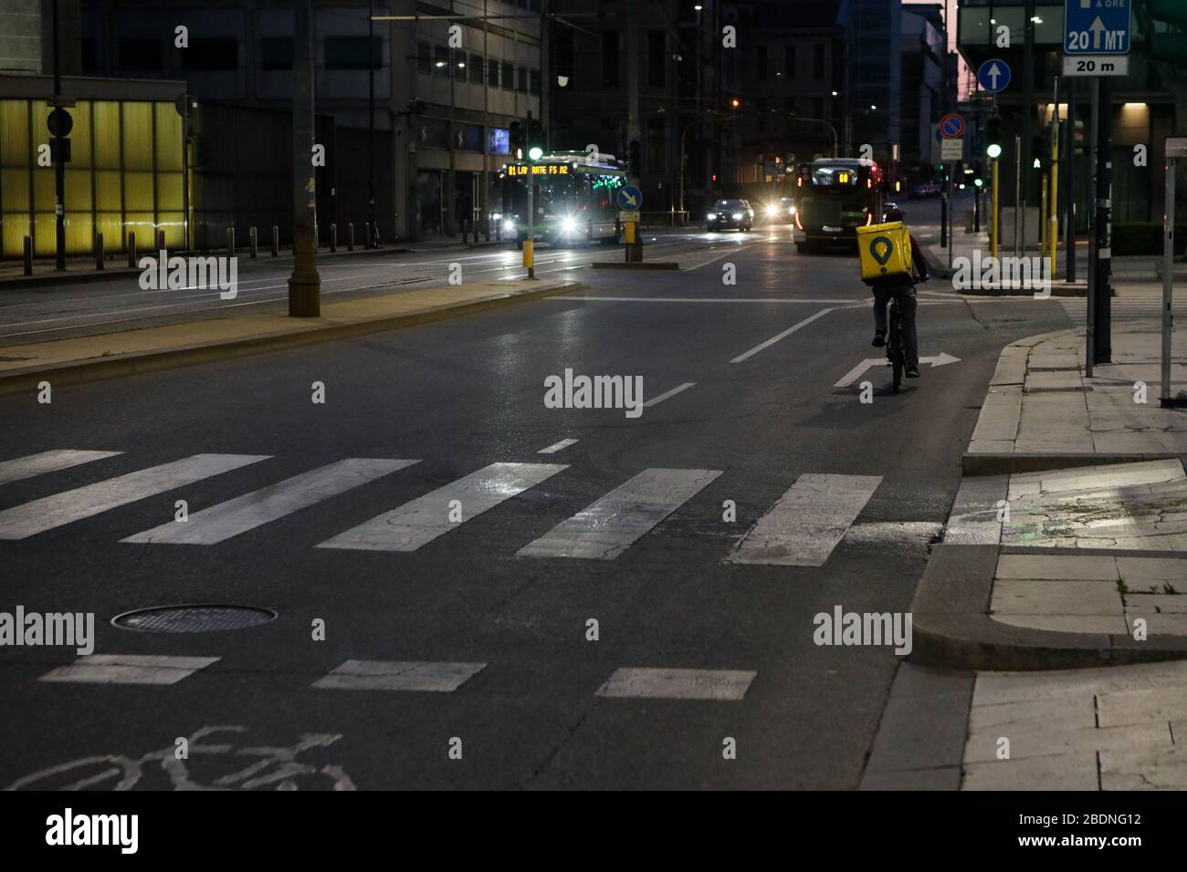The facade of Milan Central Station illuminated with the Italian flag ...