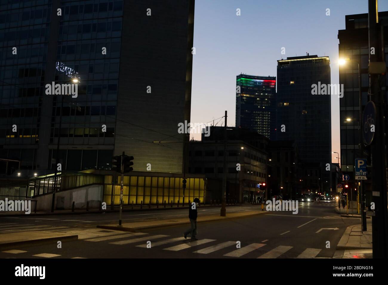The facade of Milan Central Station illuminated with the Italian flag ...