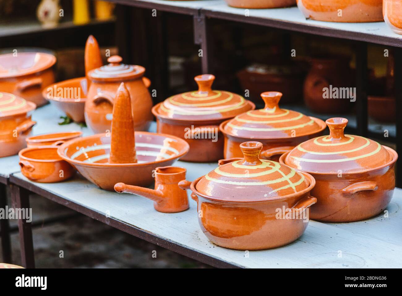 Beautiful handmade cooking pots. Ceramics / pottery objects Stock Photo ...
