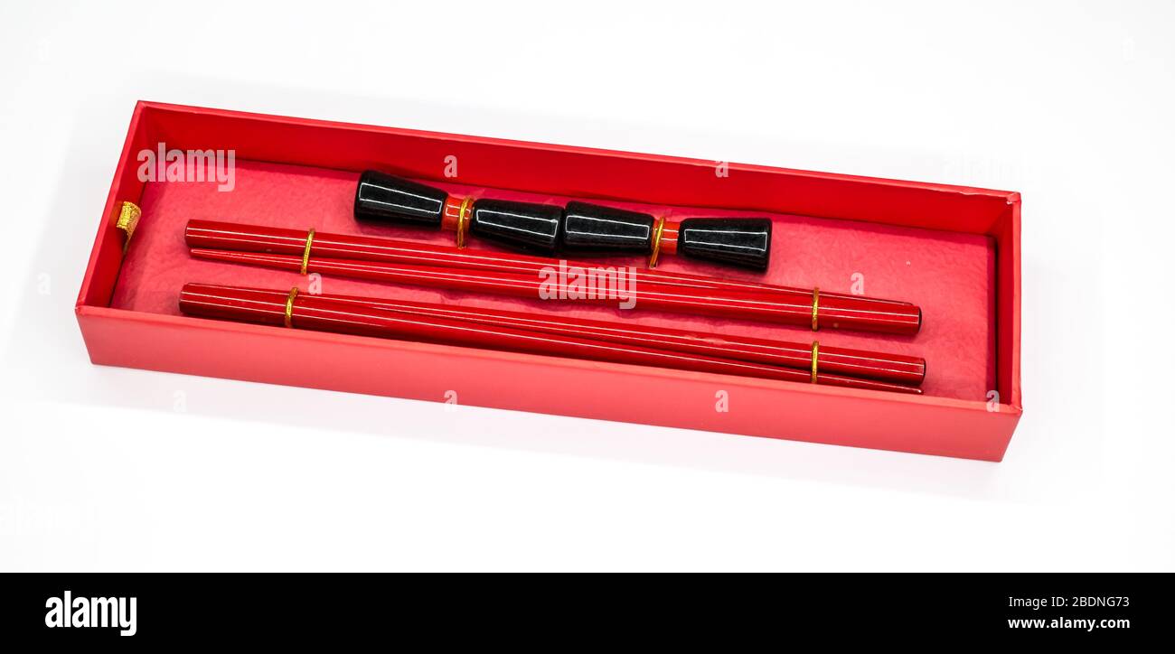 Food red chopsticks set in the red box Stock Photo - Alamy