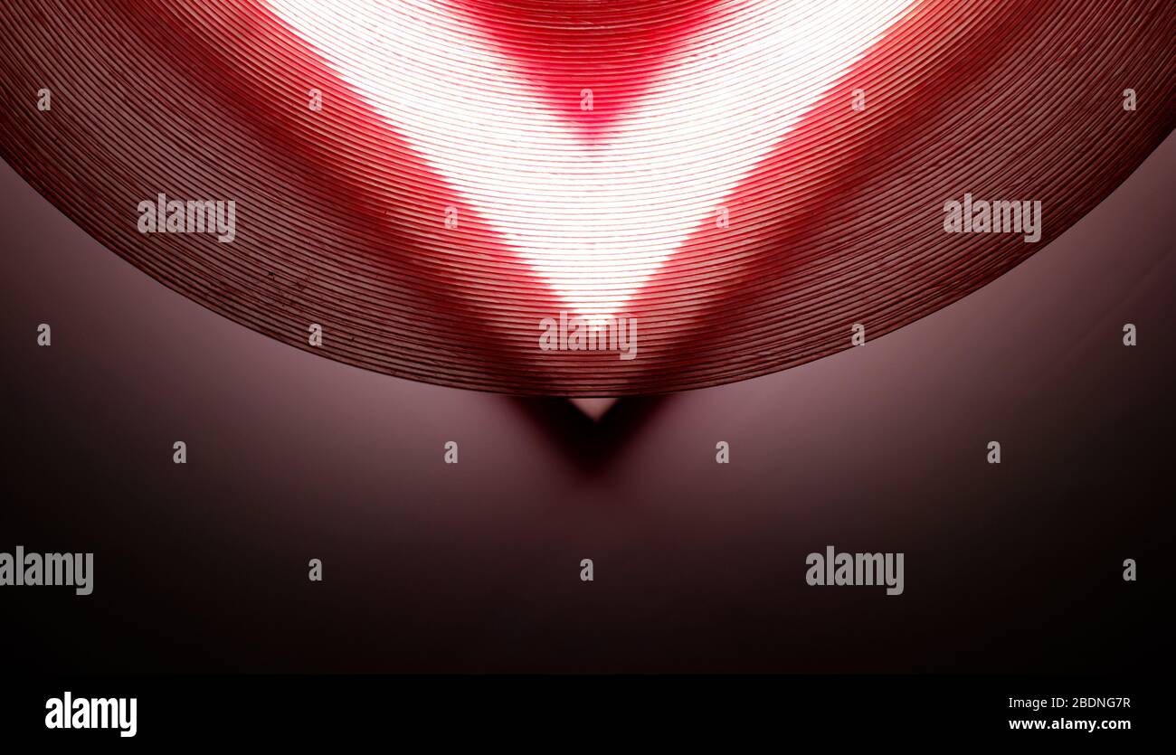glowing triangular led red light and dark circle, low angle Stock Photo ...