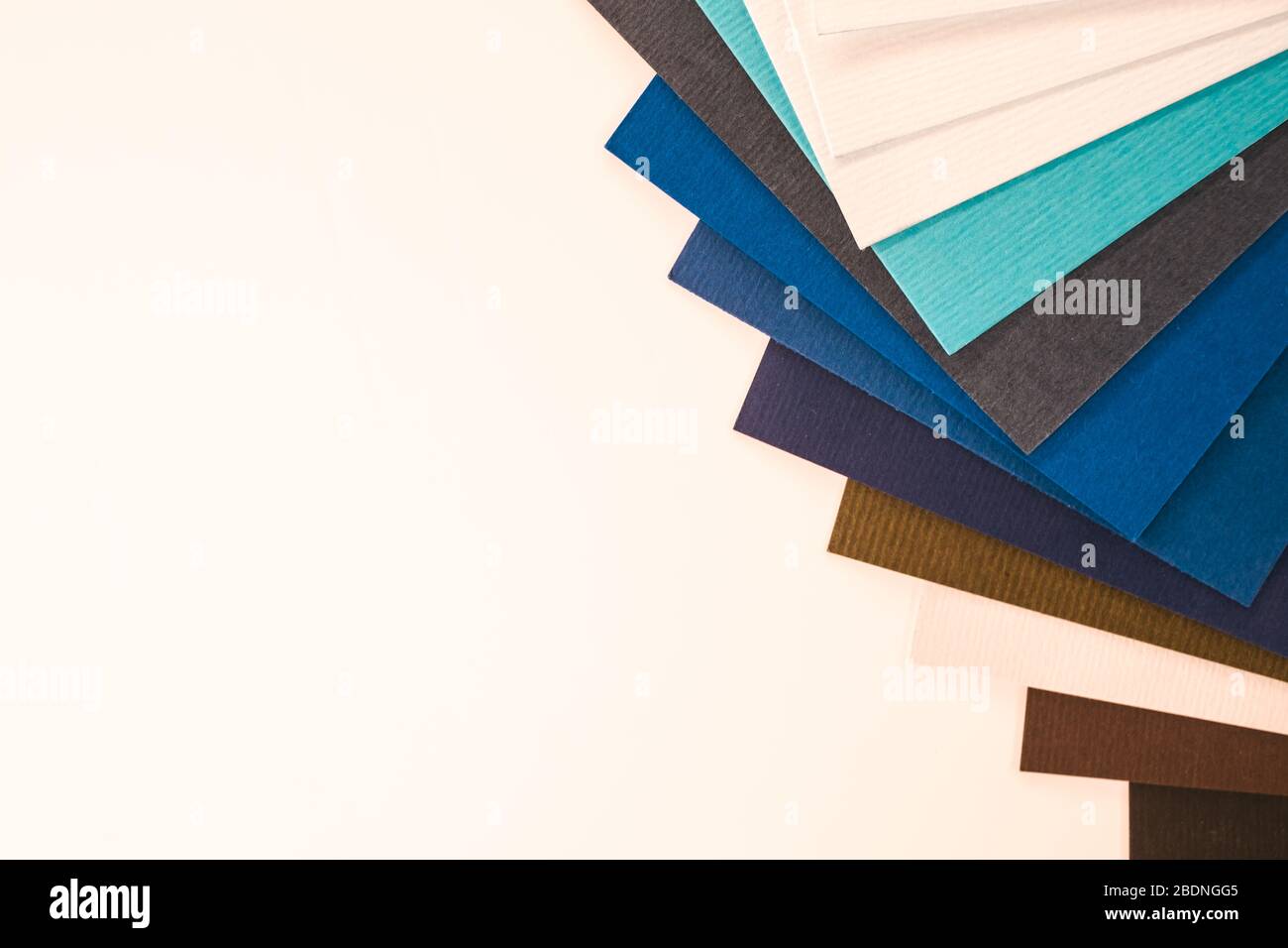 Sheets of colored paper on white background Stock Photo - Alamy