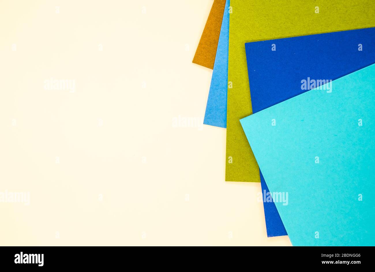 Sheets of colored paper on white background Stock Photo - Alamy