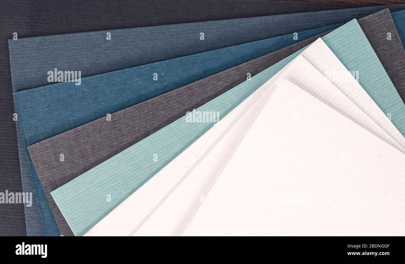 Sheets of colored paper on white background Stock Photo - Alamy