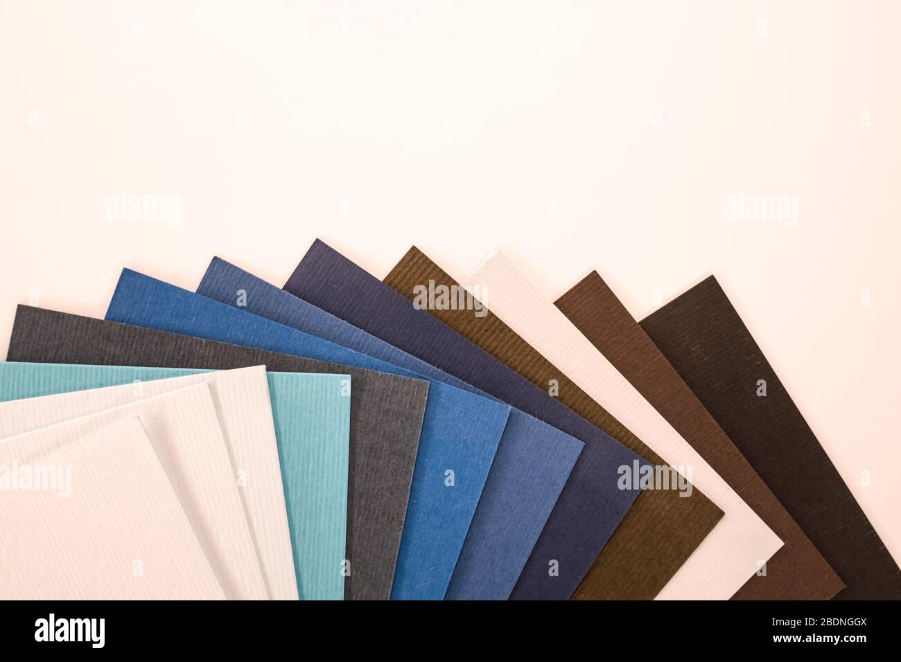 Sheets of colored paper on white background Stock Photo - Alamy