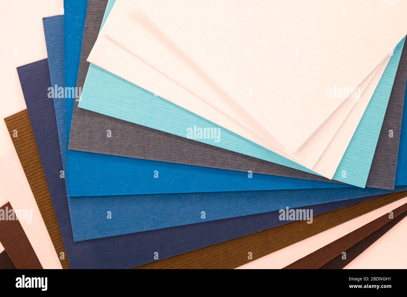 Sheets of colored paper on white background Stock Photo - Alamy