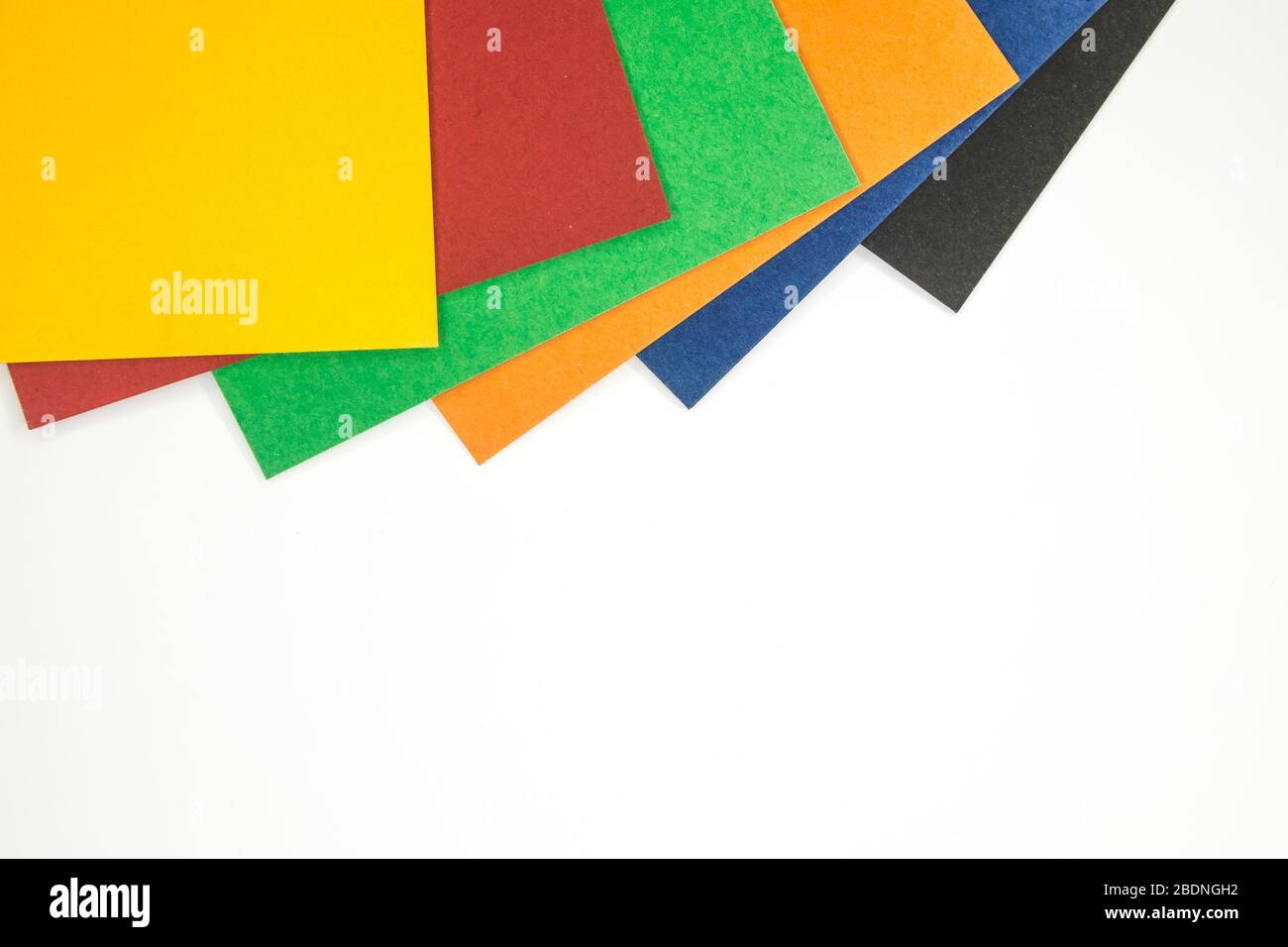 Sheets of colored paper on white background Stock Photo - Alamy