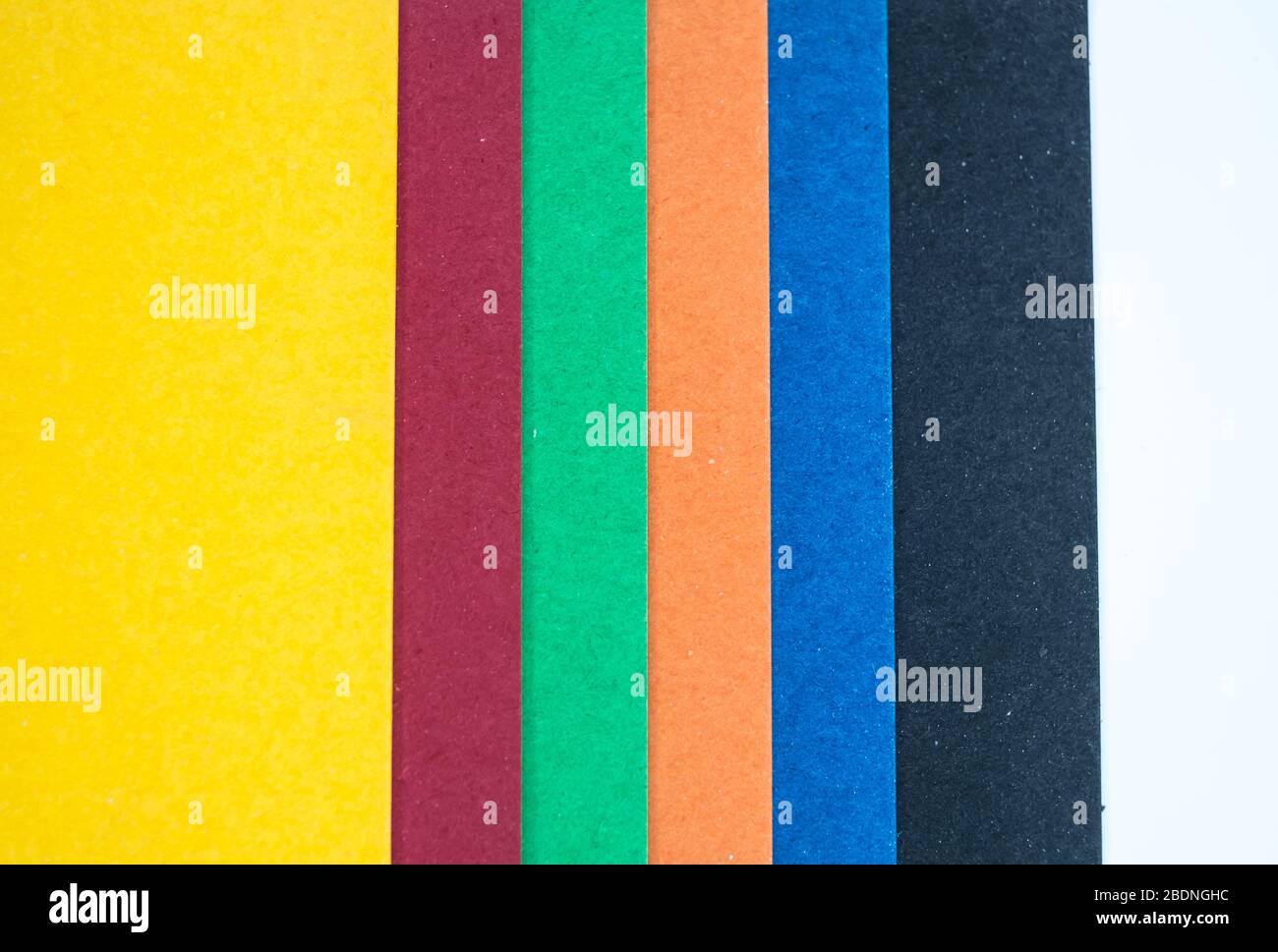 Sheets of colored paper on white background Stock Photo - Alamy
