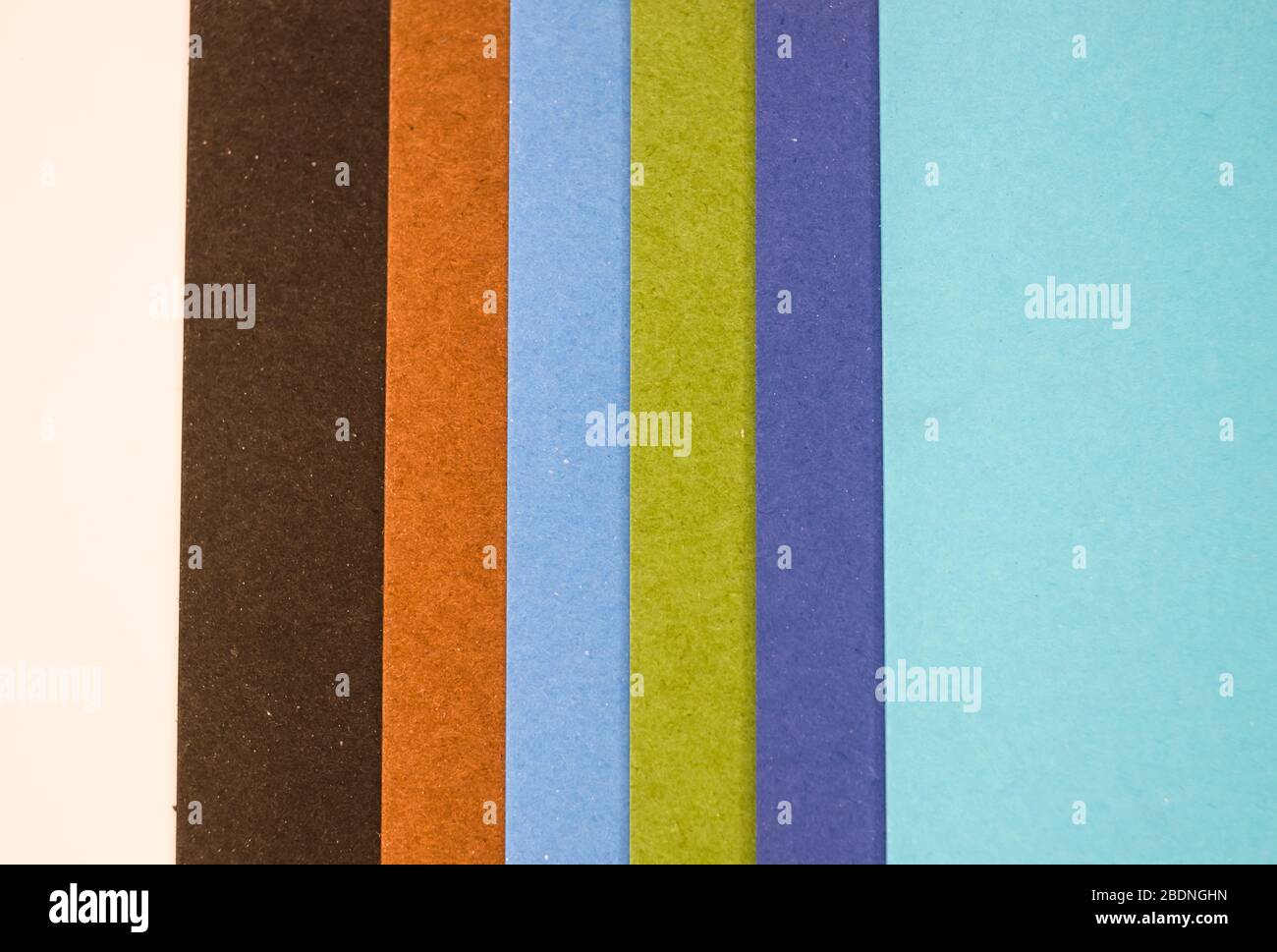 Sheets of colored paper on white background Stock Photo - Alamy
