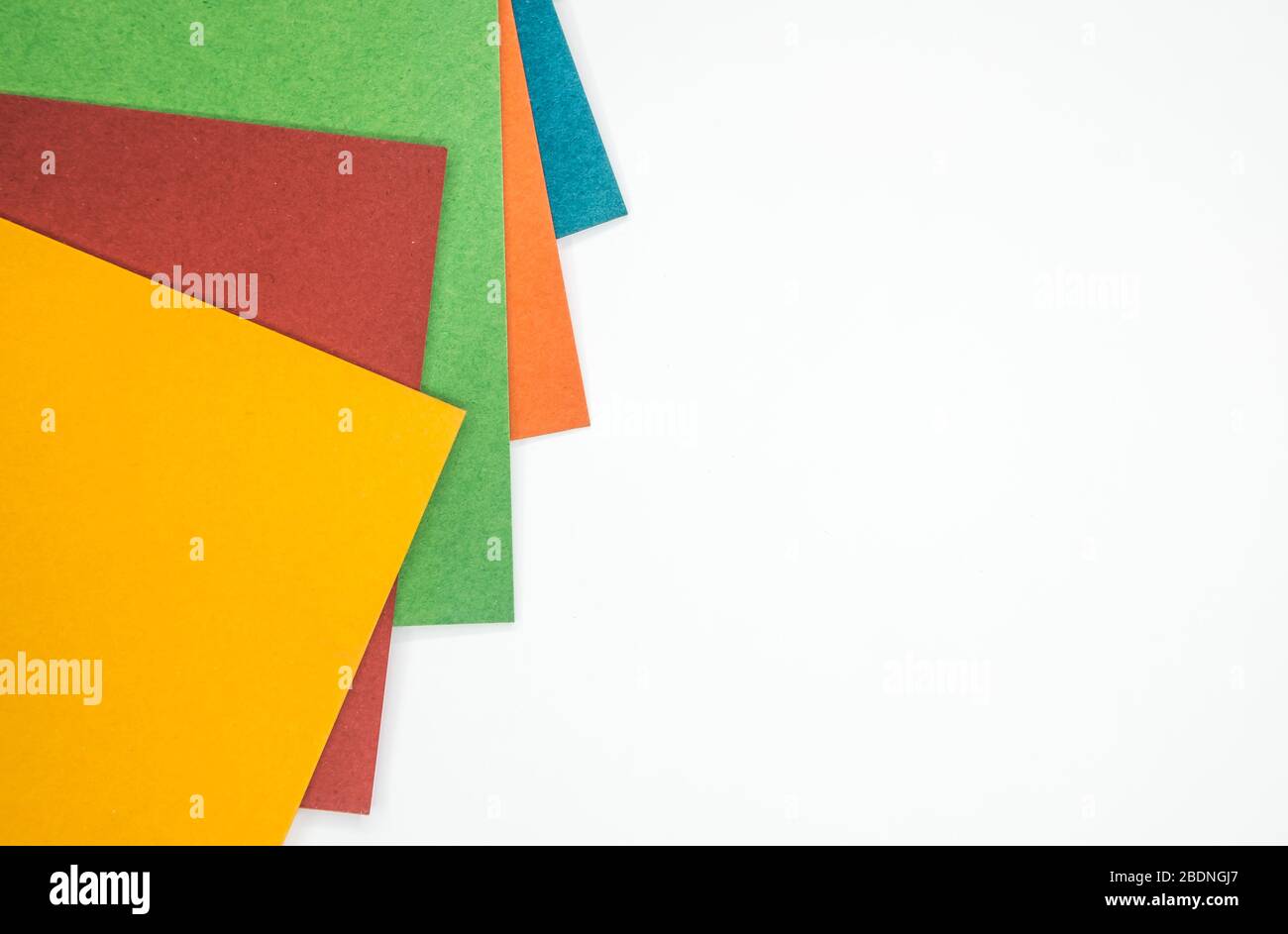 Sheets of colored paper on white background Stock Photo - Alamy