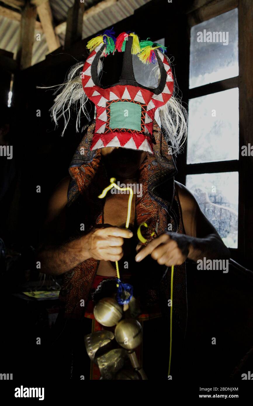 A performer of caci (Indonesia's traditional whip-fight show) is ...
