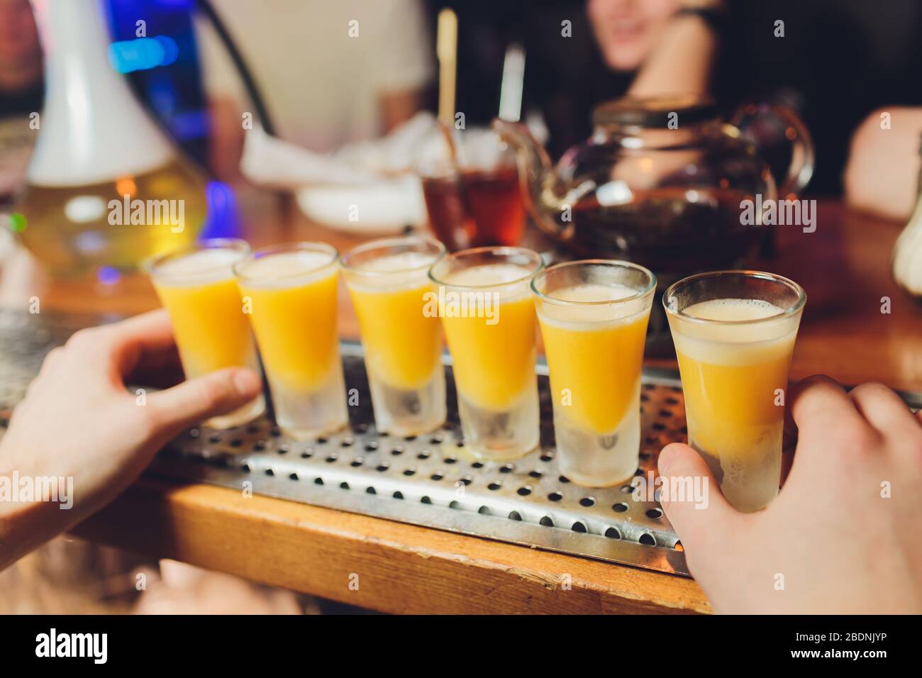 Cozy home holiday concept. Tasty alcoholic sweet drinks fruits juices ...