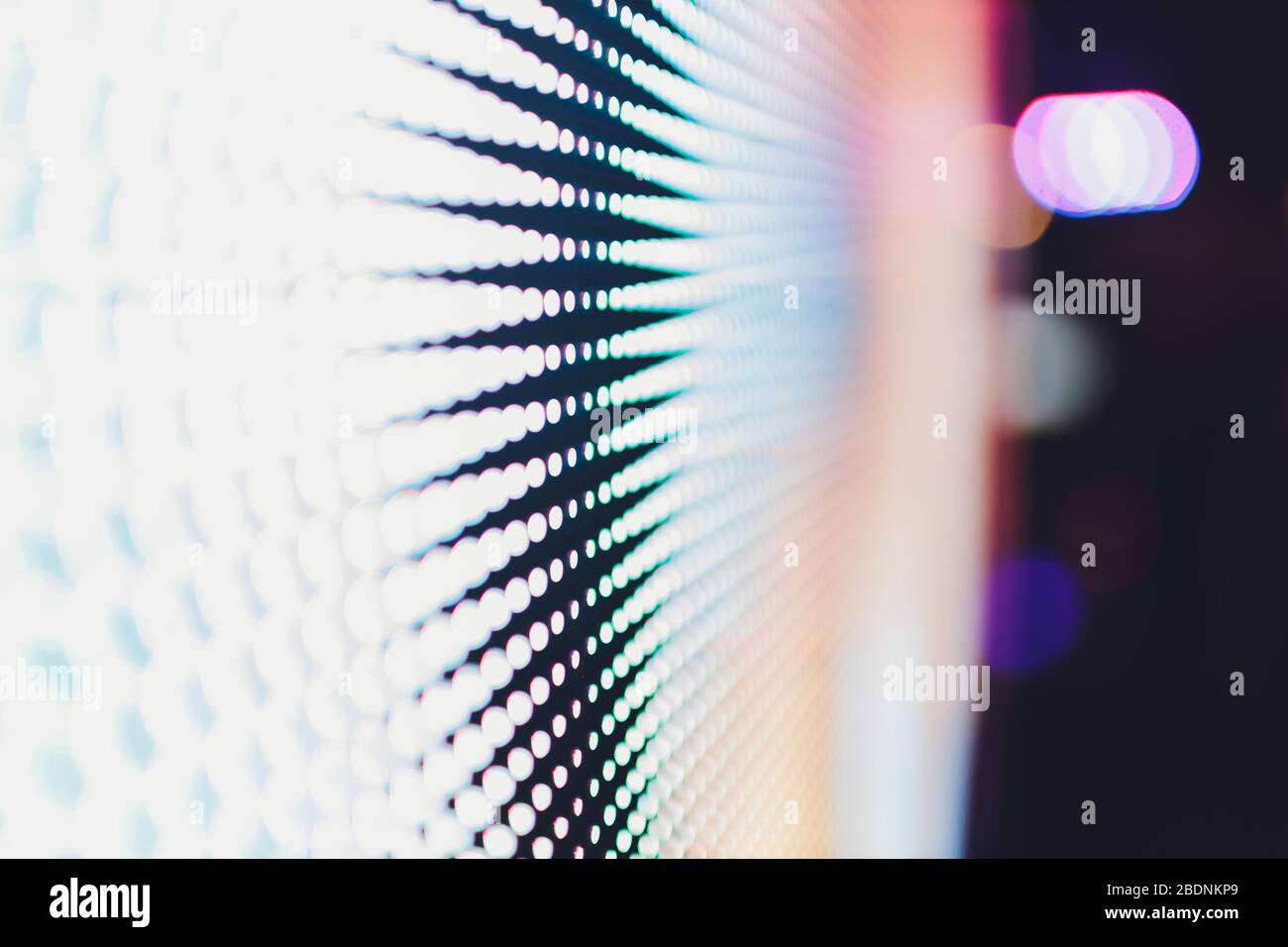 Bright colored blue LED wall with pink pattern - close up background ...