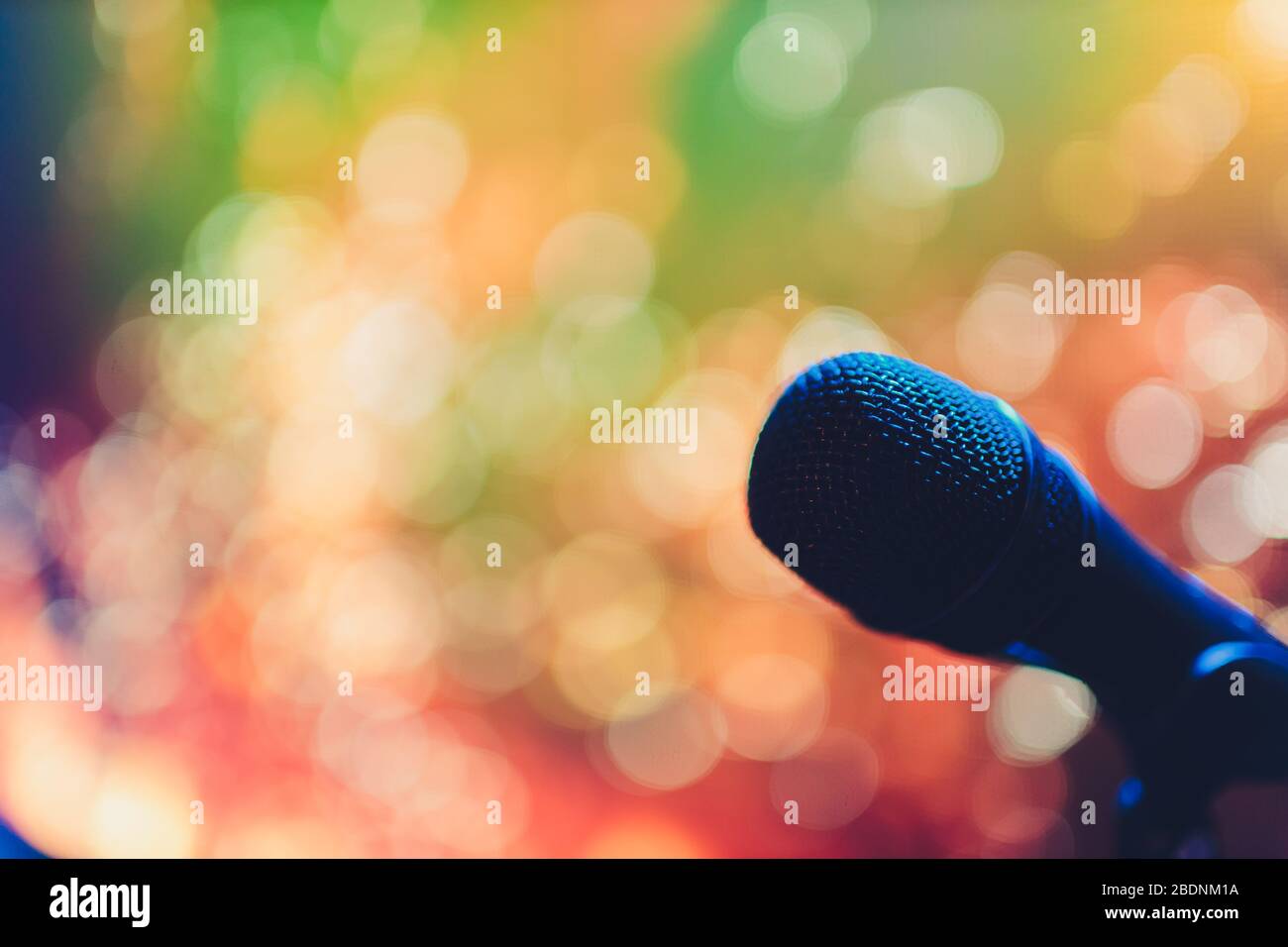 Close up of microphone on stage in audience room blur background Stock ...