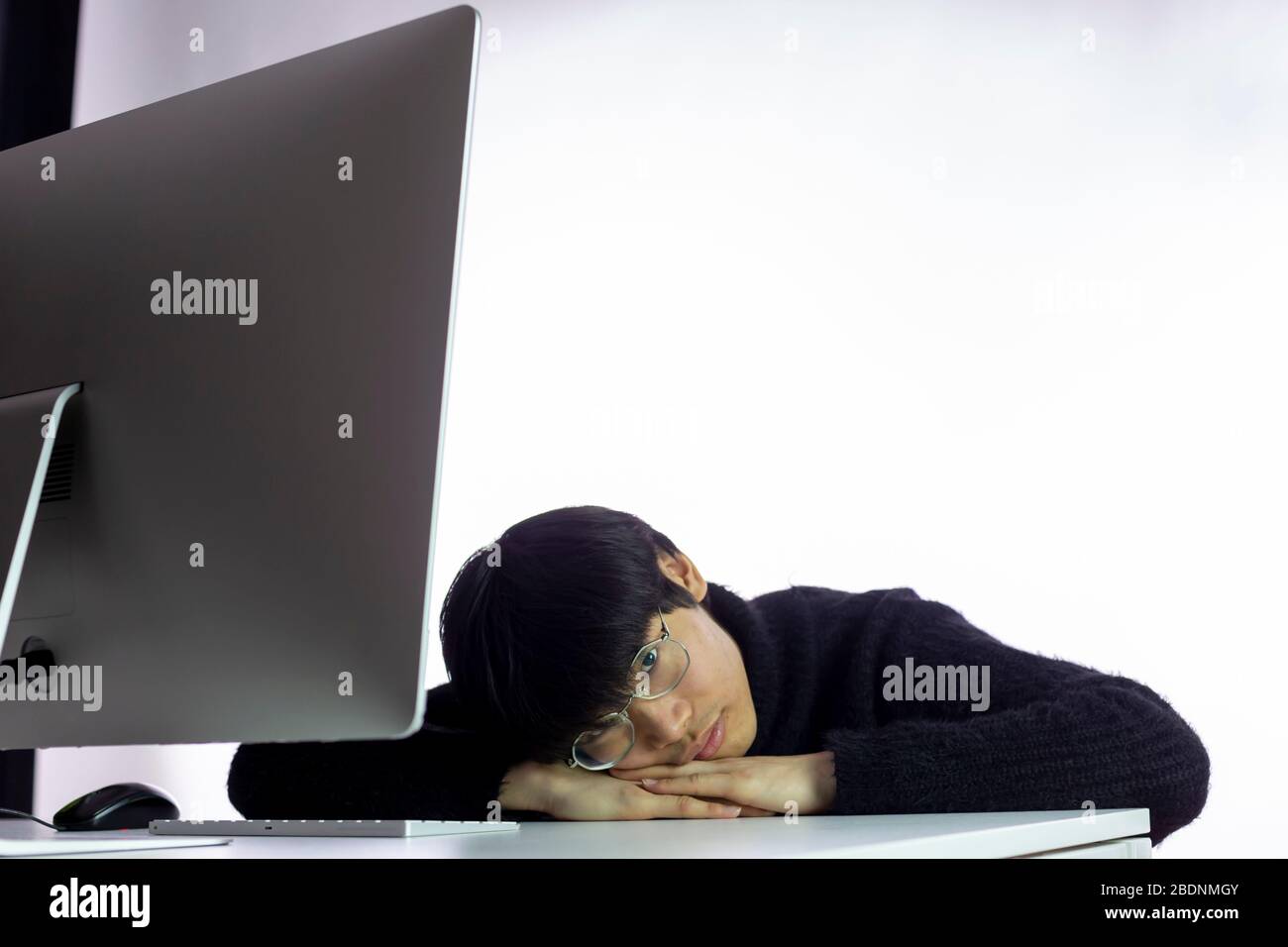 Asian overworked men looks exhausted, tired of work. Burnout concept ...