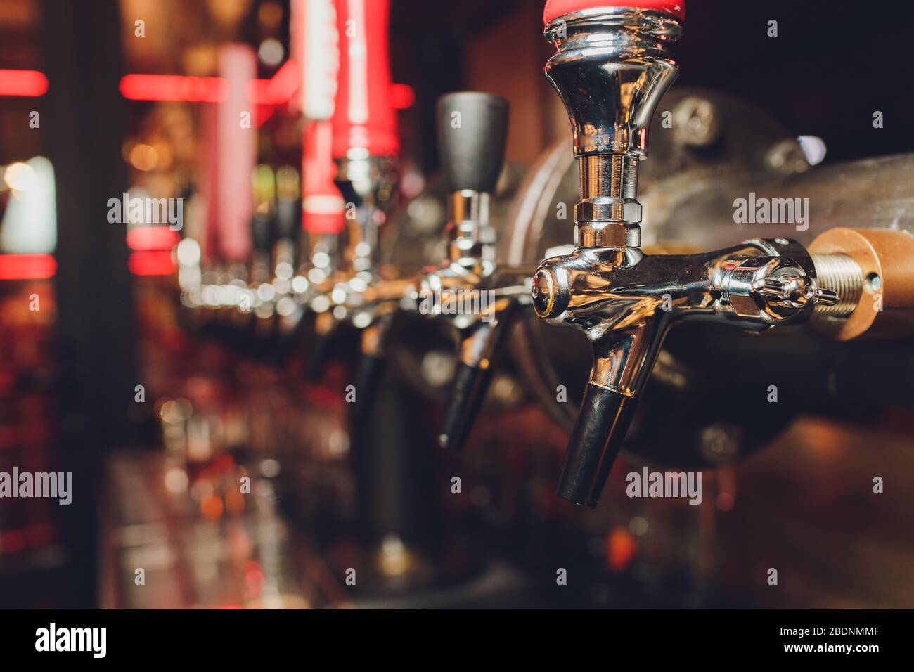 The bar counter with bottles and apparatus for dispensing beer ...