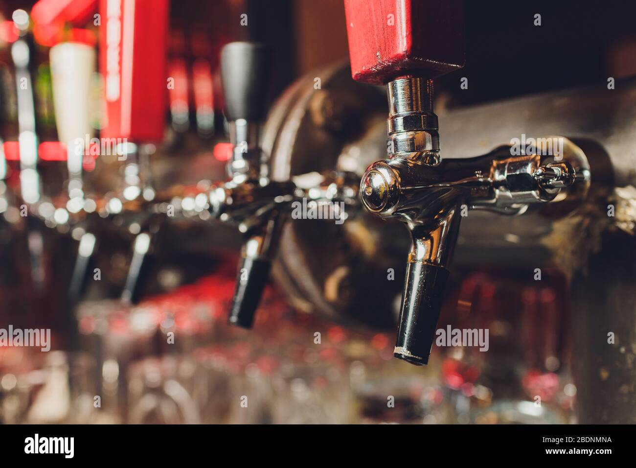 The bar counter with bottles and apparatus for dispensing beer ...