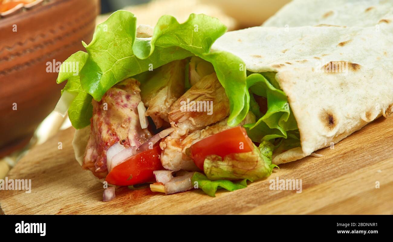 Chicken Butter Masala Wrap, Street Food Style close up Stock Photo - Alamy
