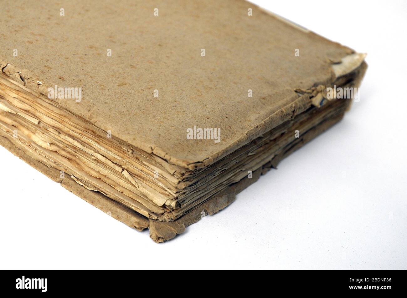 detail of old book, worn paper, course of the years in the materials ...