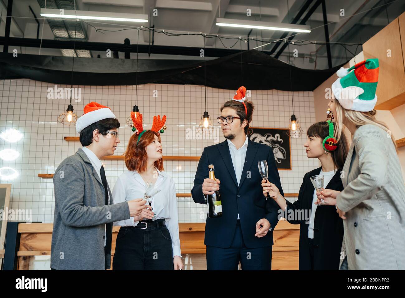 Happy colleagues in office celebrate special event Stock Photo - Alamy