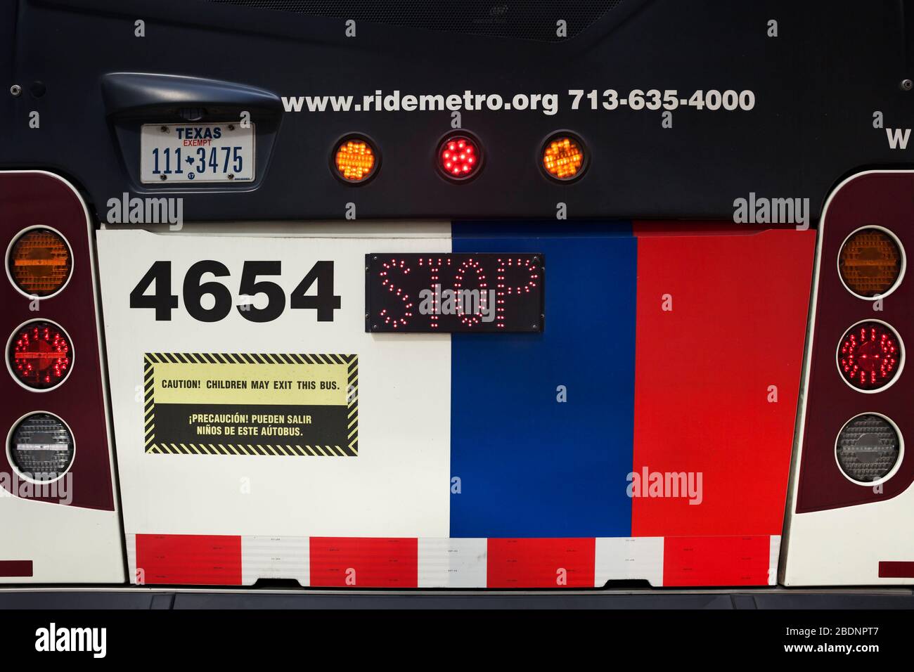 Horizontal close-up view of the colorful rear of the 53 bus to Downtown ...