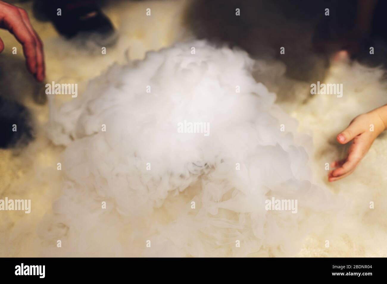 Liquid nitrogen in a glass on a black background Stock Photo - Alamy