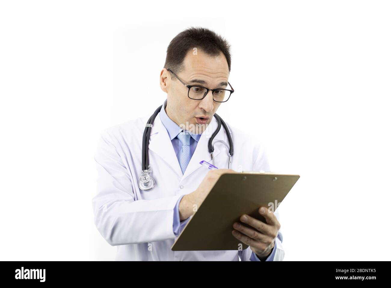 Surprised doctor checks patient's medical record on clipboard ...