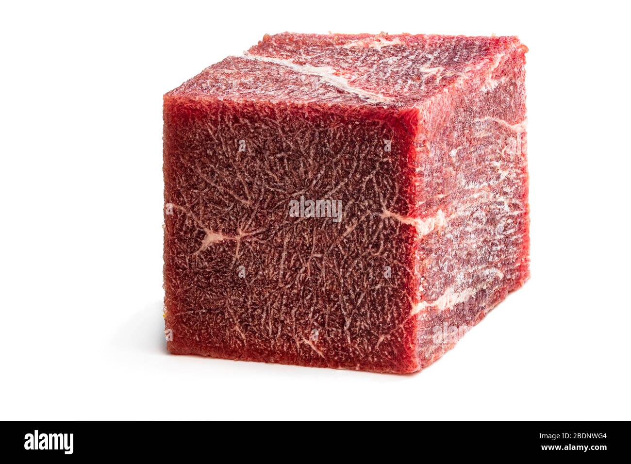 Piece of frozen meat cubic shape concept of routinely eaten food Stock ...