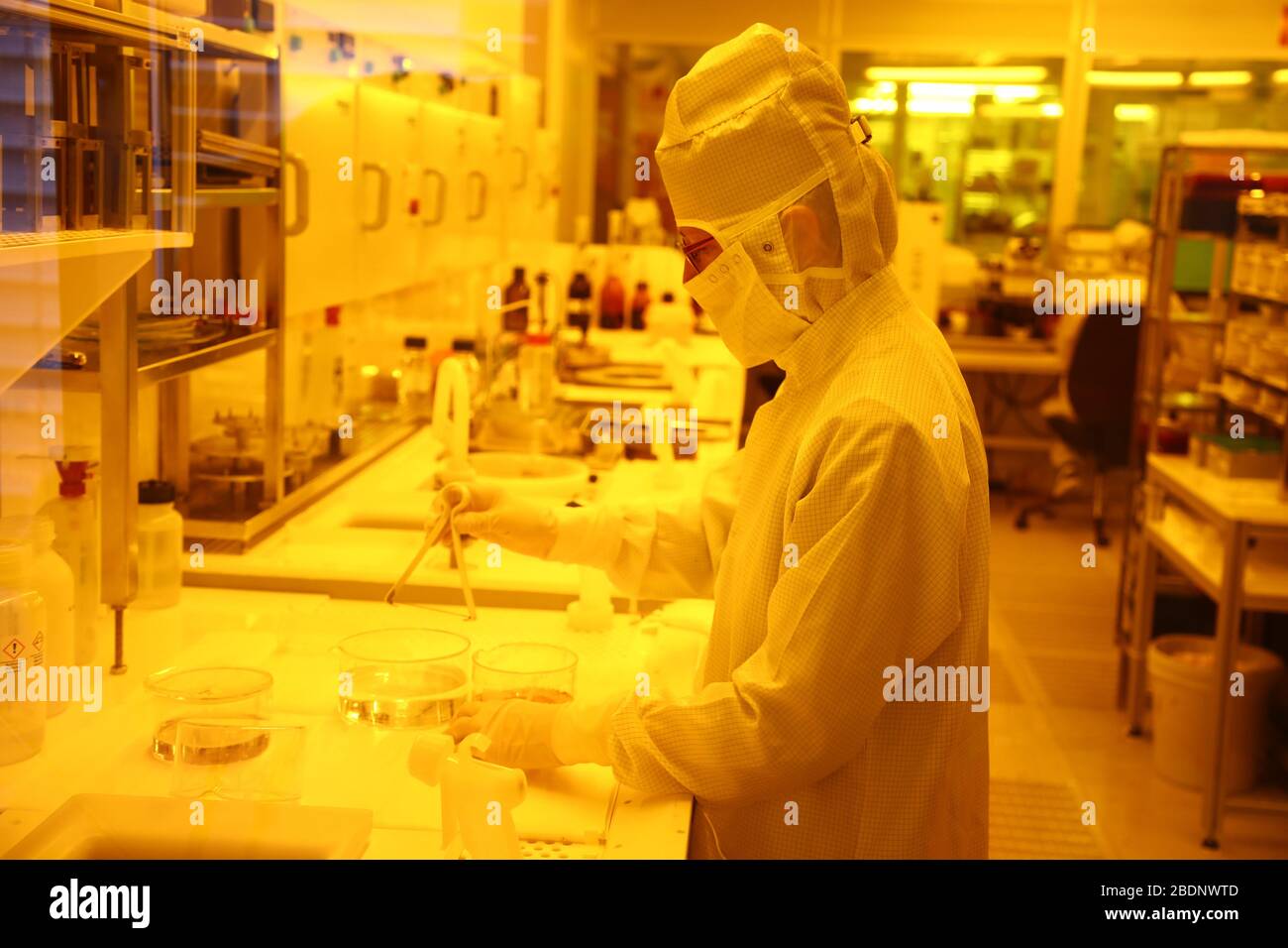 Jena, Germany. 09th Apr, 2020. An employee produces wafers with the ...