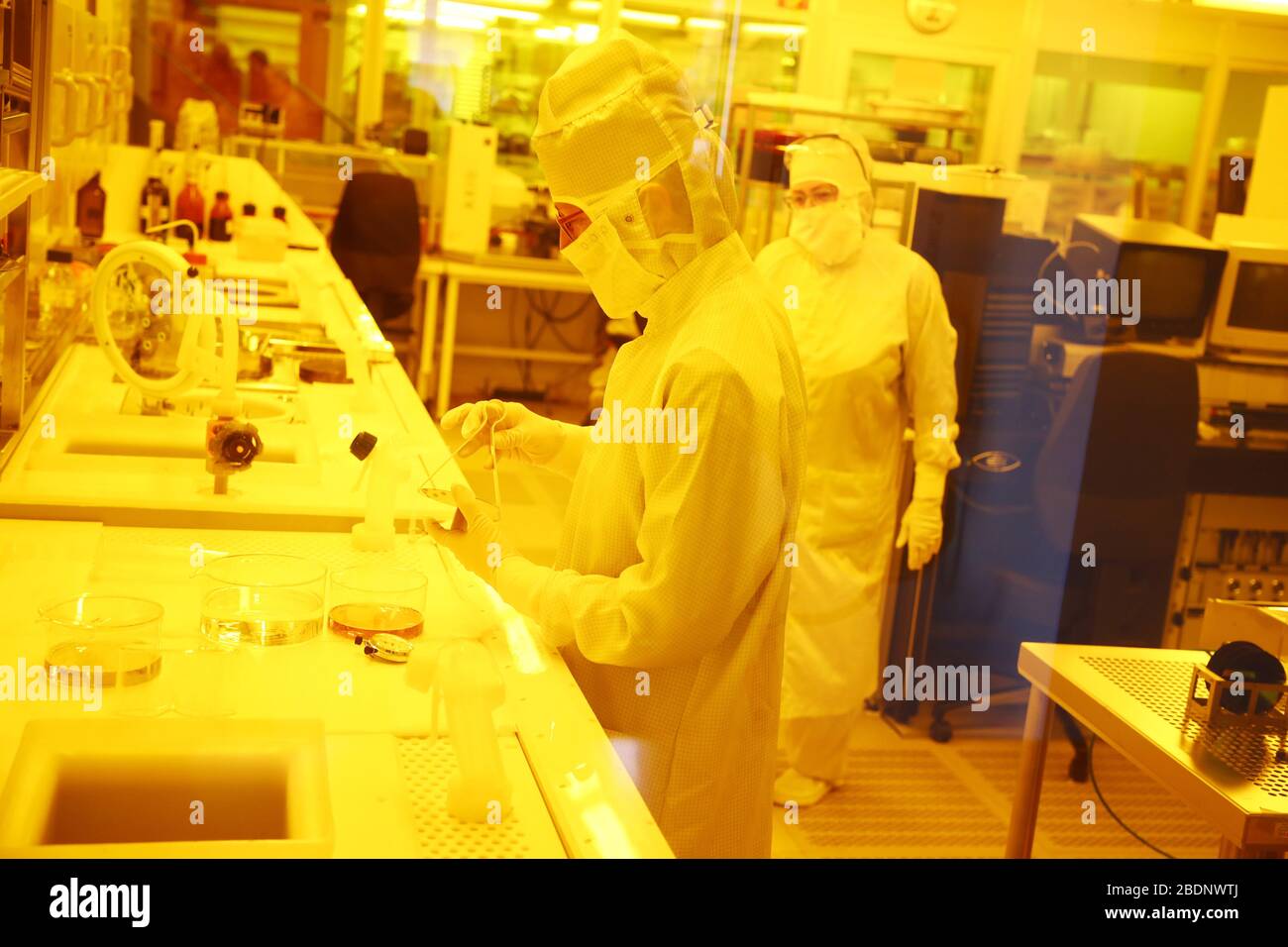 Jena, Germany. 09th Apr, 2020. An employee produces wafers with the ...