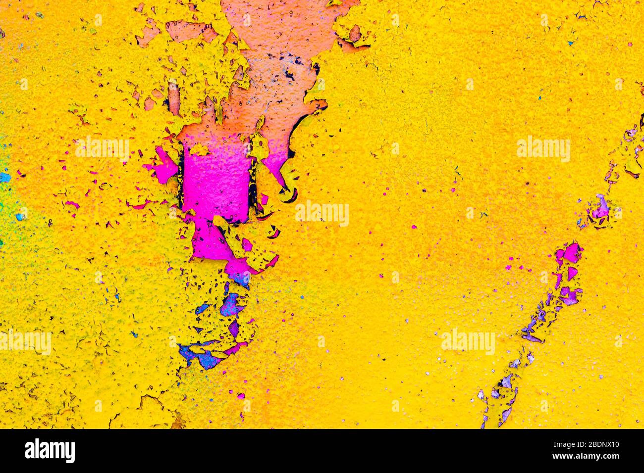 Fragment of colorful graffiti painted on a concrete wall. Bright yellow ...