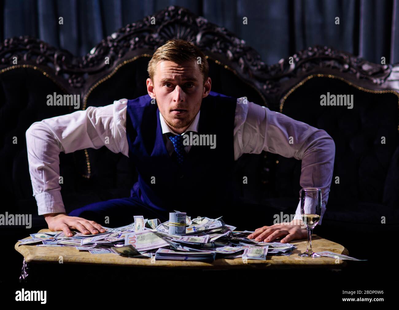 Illegal profit concept. Man, businessman, boss with strict face leaning ...