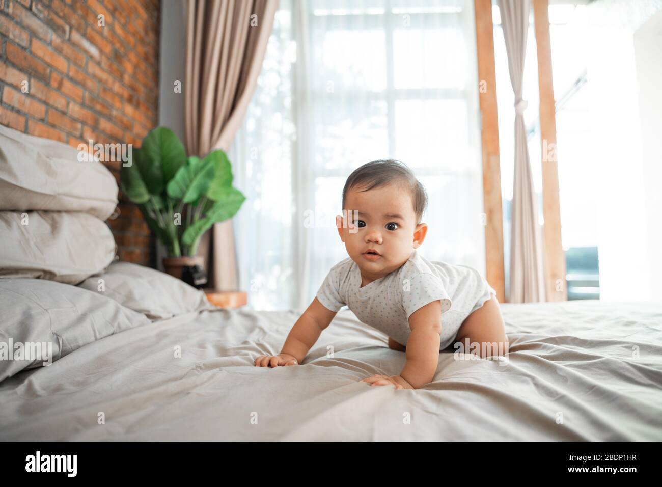 Asian boy wake up bed hi-res stock photography and images - Alamy