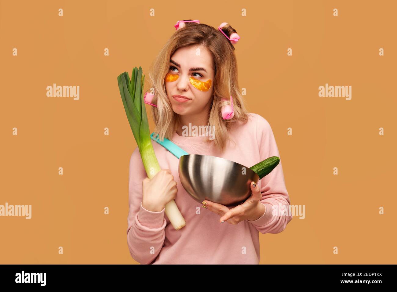 Girl looks up thoughtfully, remembering important Stock Photo - Alamy