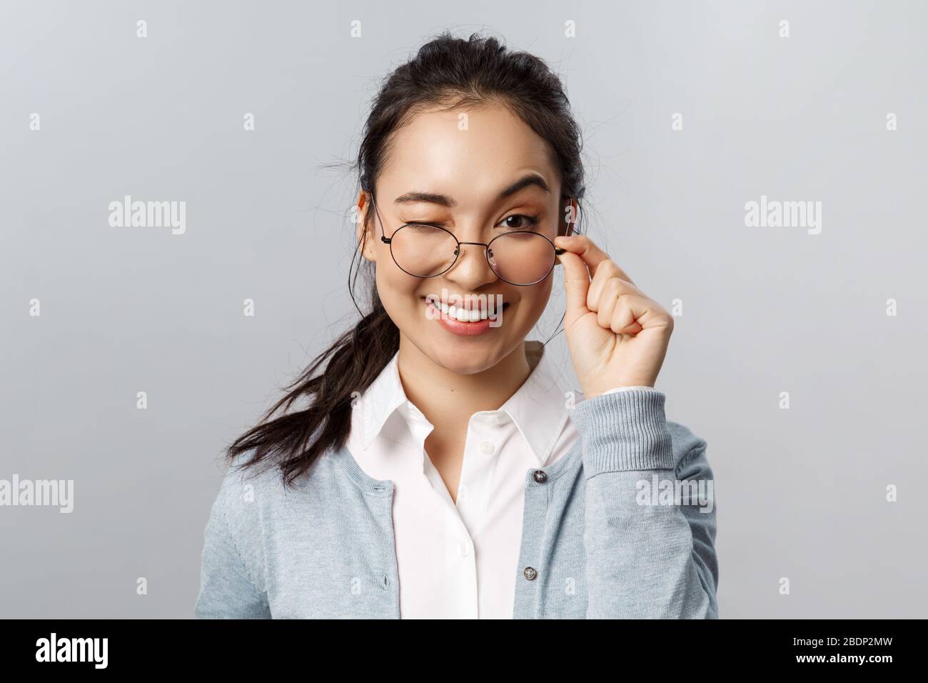 Advertisement, people and emotion concept. Close-up of cheeky smiling ...