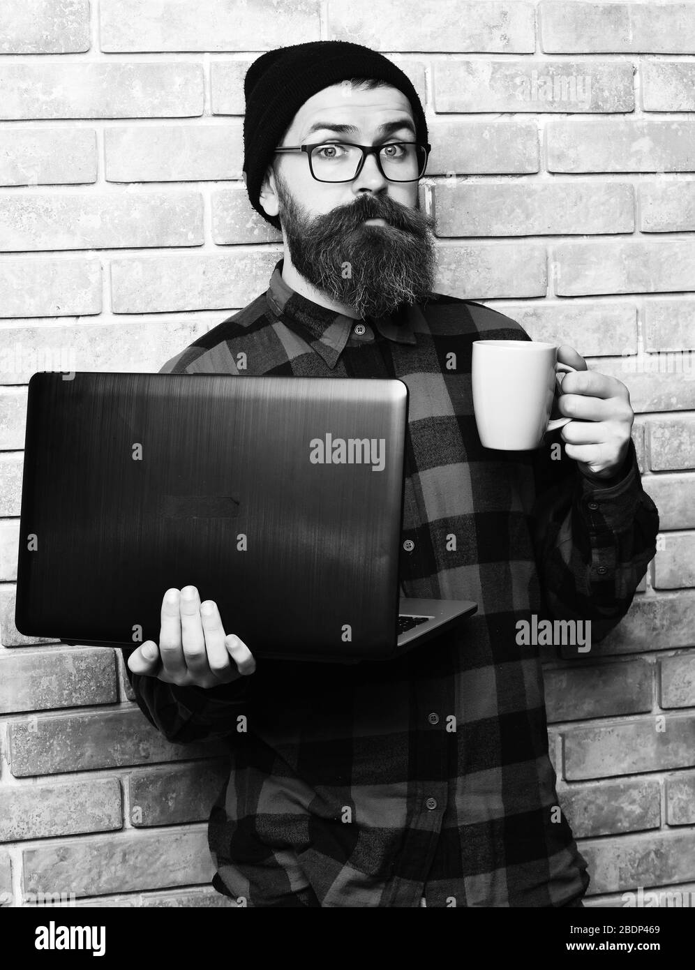 Man in beige hat Black and White Stock Photos & Images - Alamy