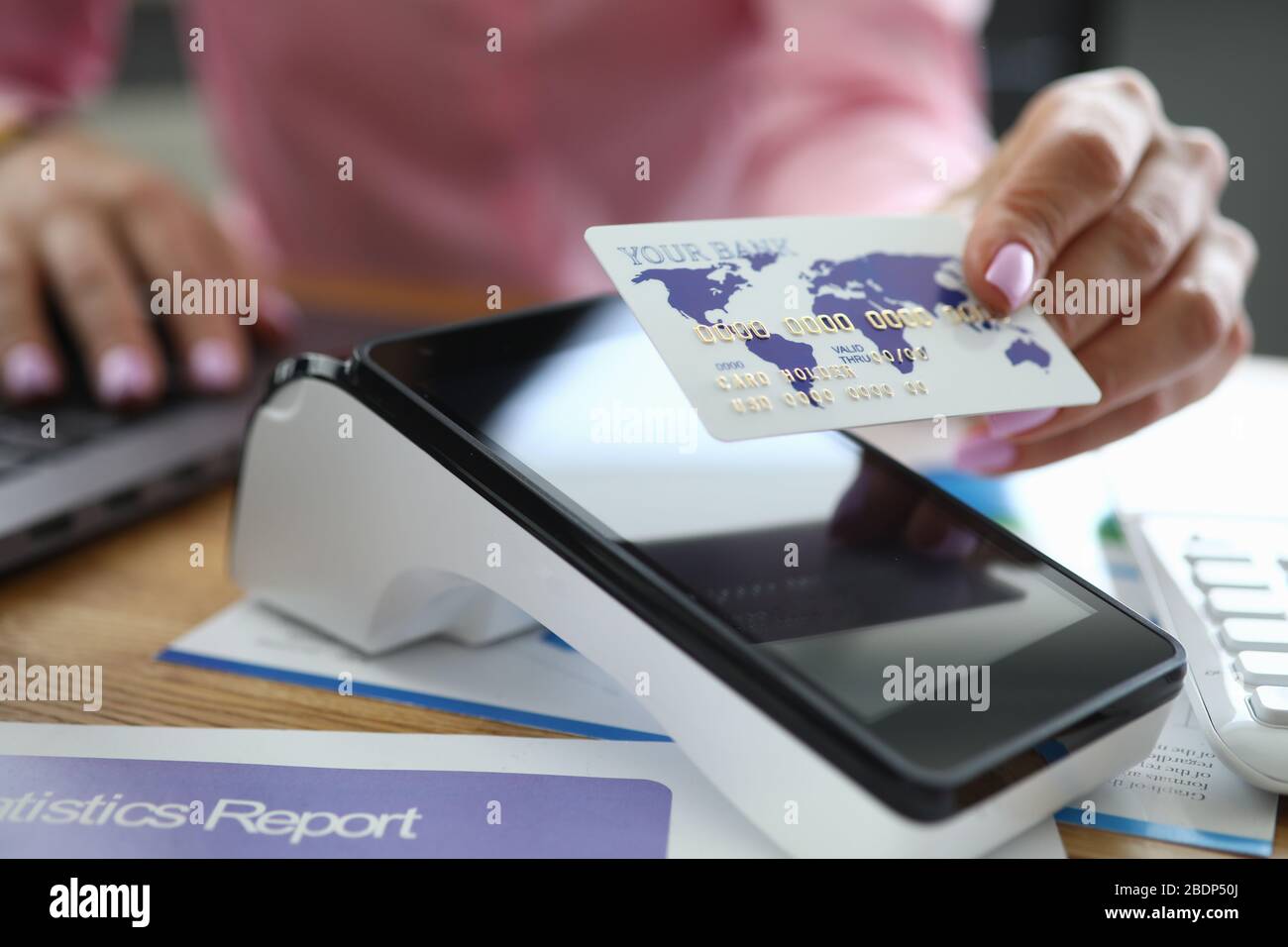 Woman working in bank Stock Photo - Alamy