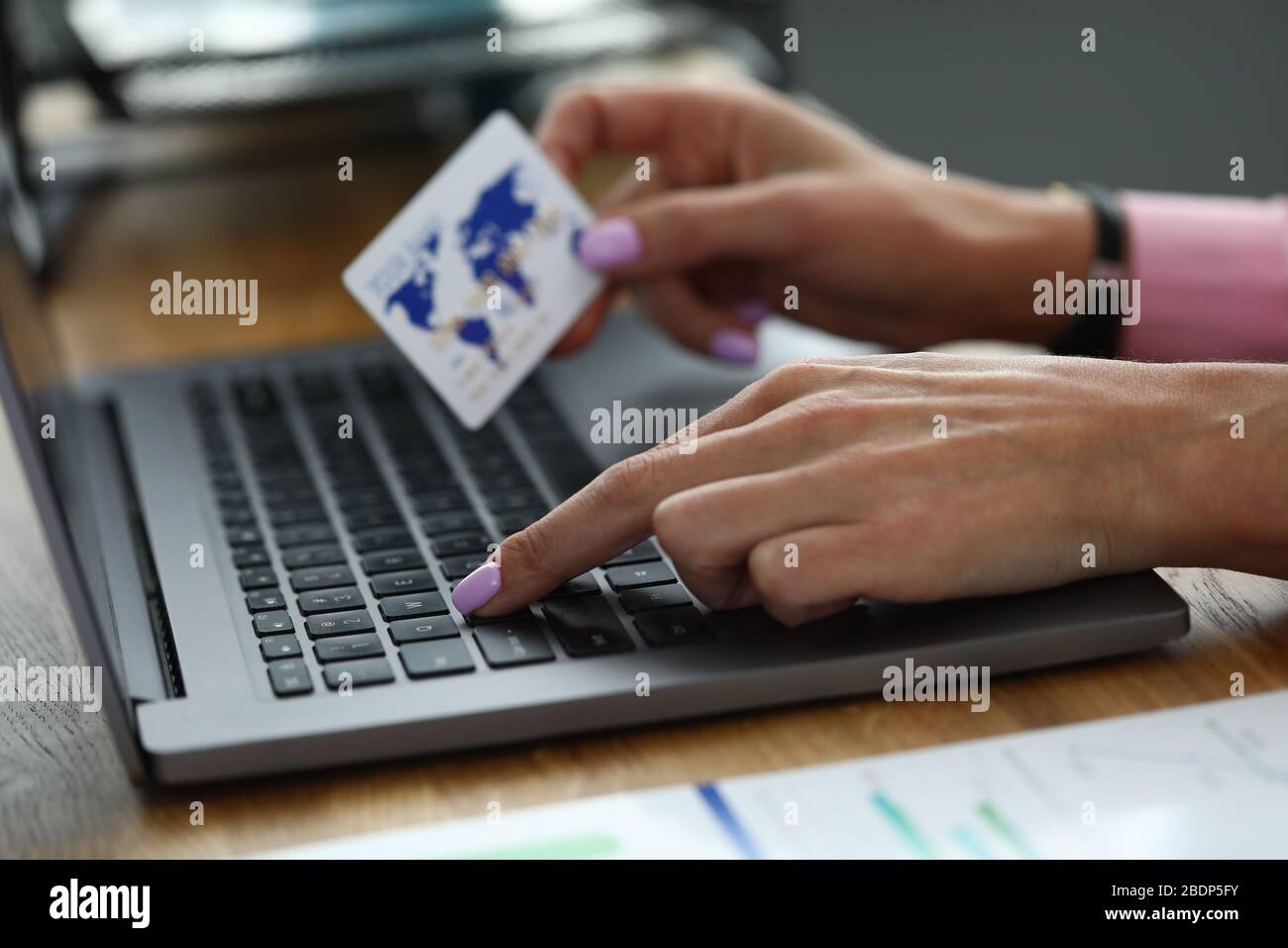 Woman using cashless payment Stock Photo - Alamy