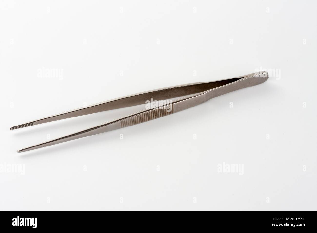 Medical surgical dressing tweezer on white background, tool used in ...