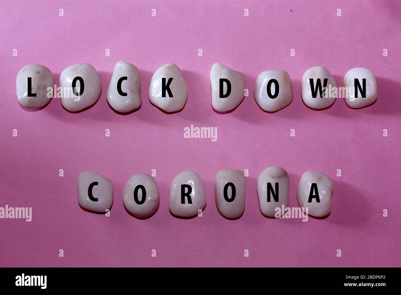 Concept Corona virus. lock down corona as a text with letters on white ...
