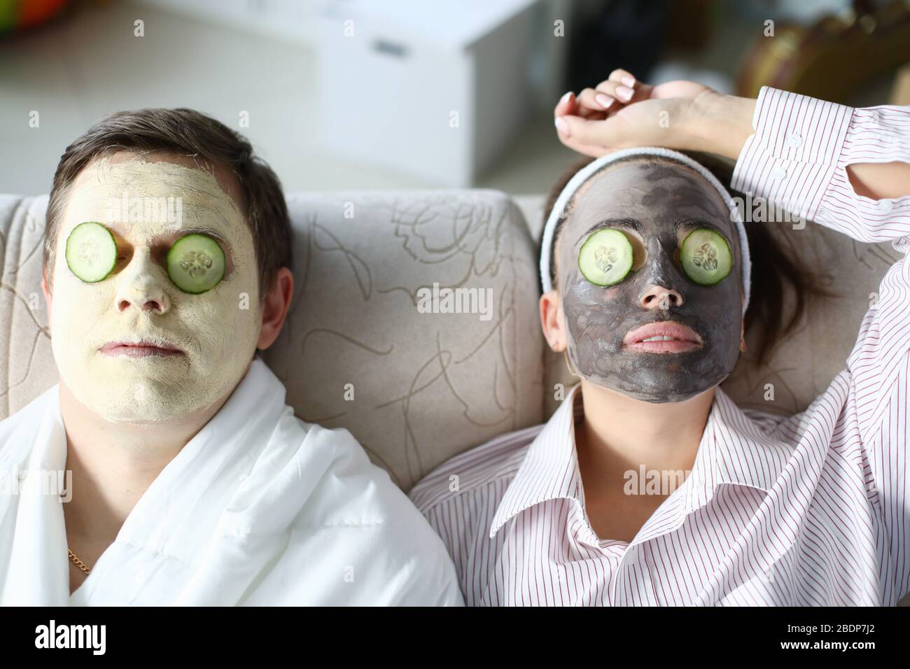 Feeling lazy resting on couch Stock Photo - Alamy