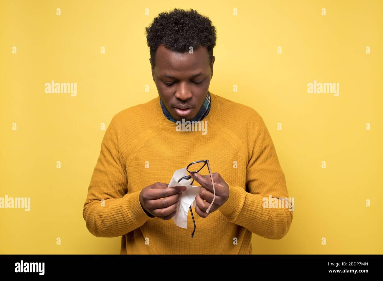 Cleaning wiping eye hi-res stock photography and images - Alamy