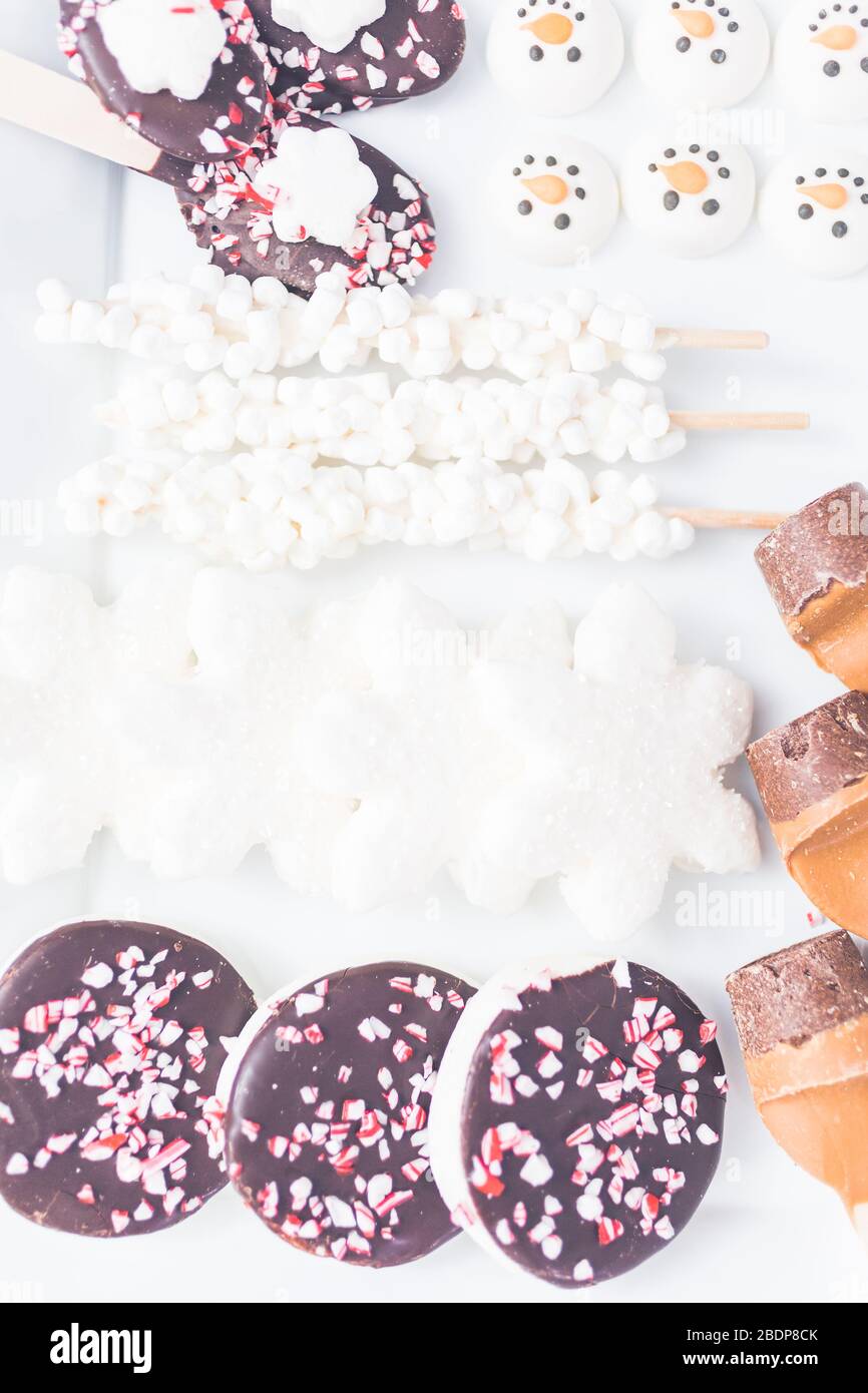 Close up view. Variety of marshmallow toppings with peppermint and ...