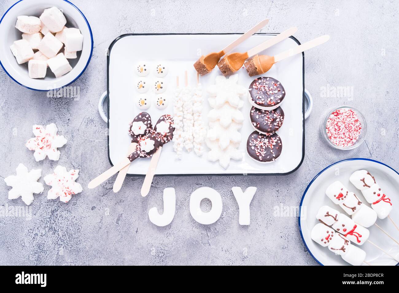 Flat lay. Variety of marshmallow toppings with peppermint and chocolate ...