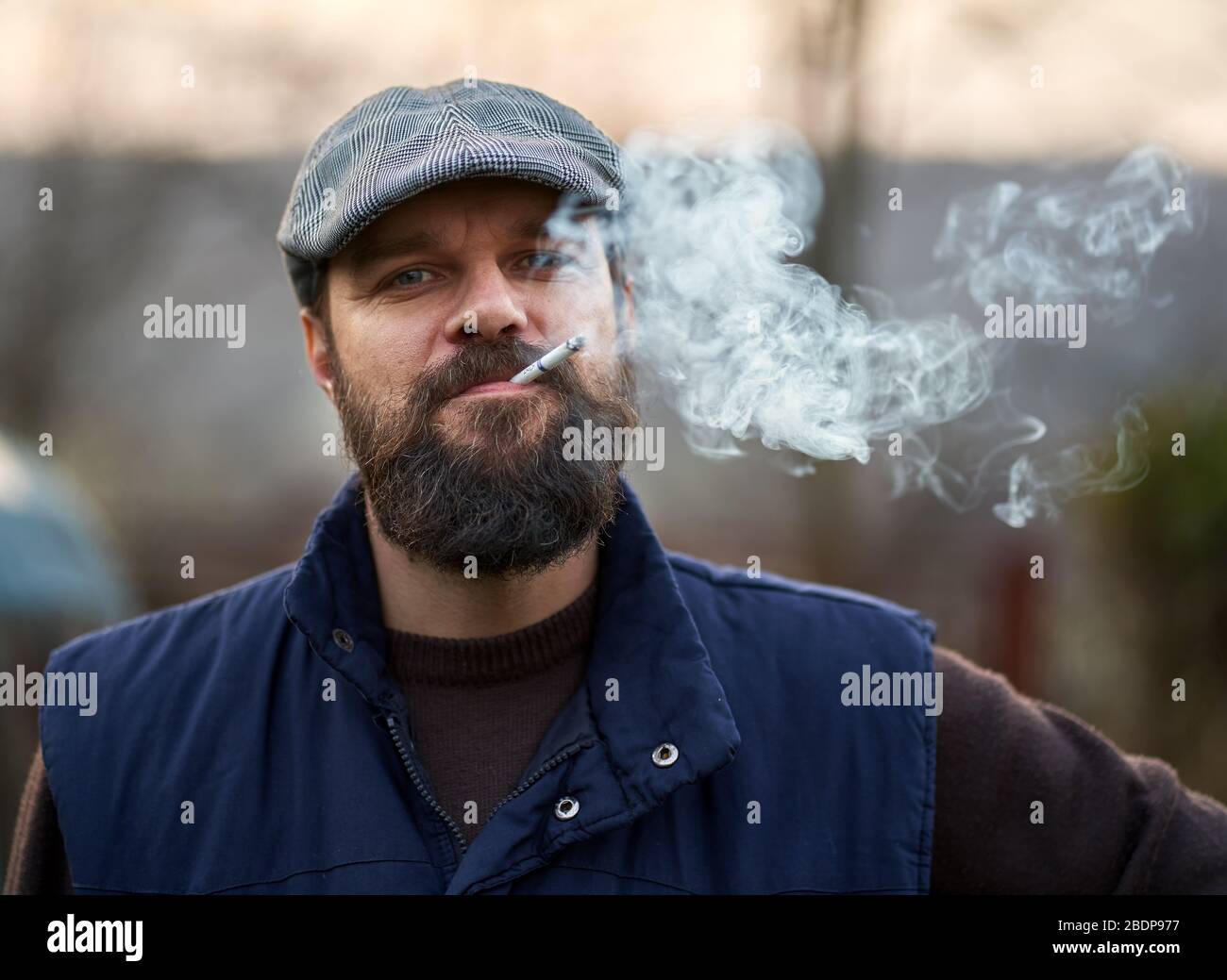 Man smoking cigarette in the forest hi-res stock photography and images ...