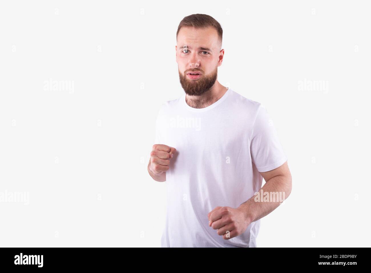 Aggressive man ready to fight, hands clenched into fists. Bullying ...