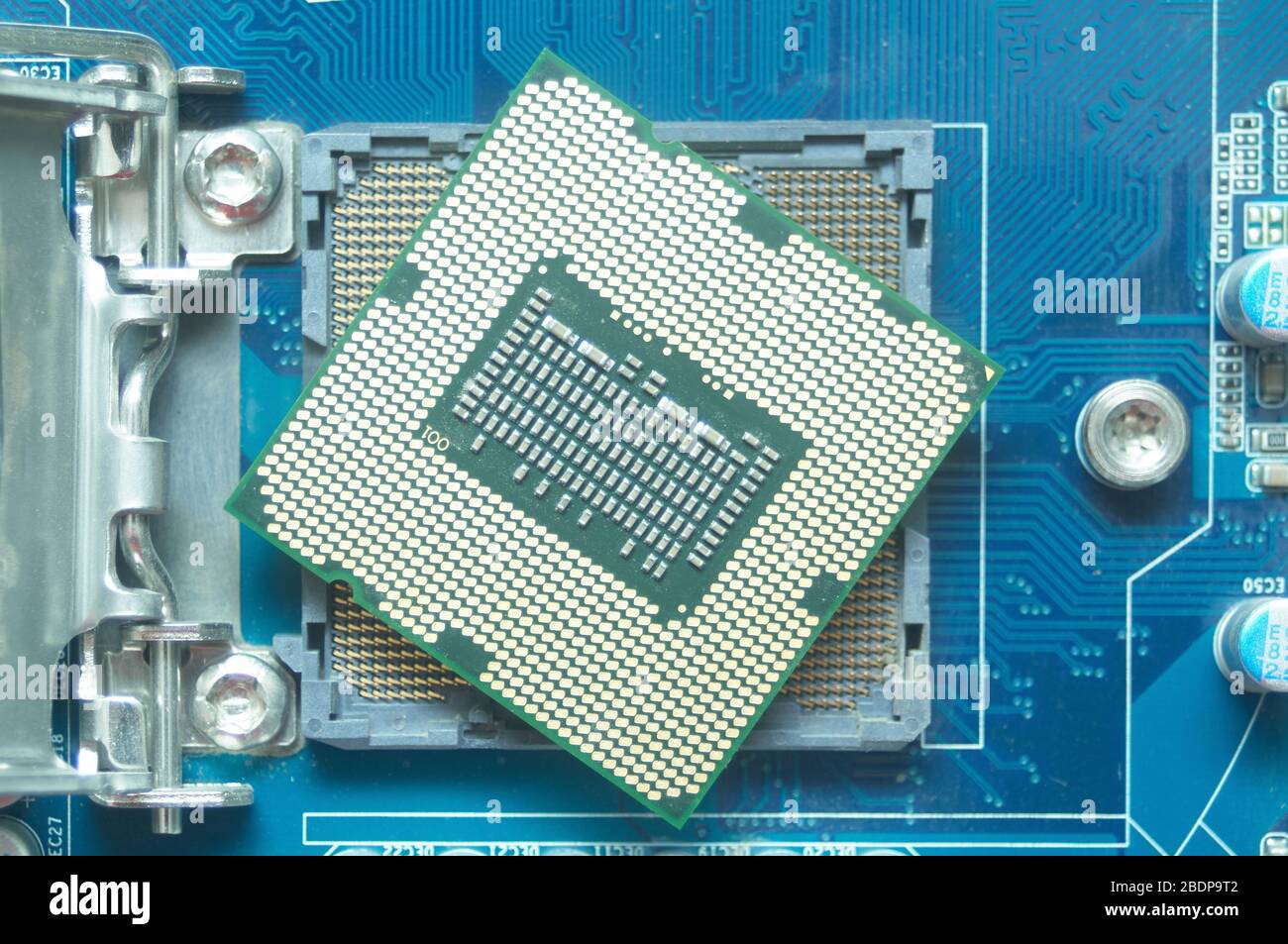 Central processor unit (CPU) and his socket on motherboard. Technical ...