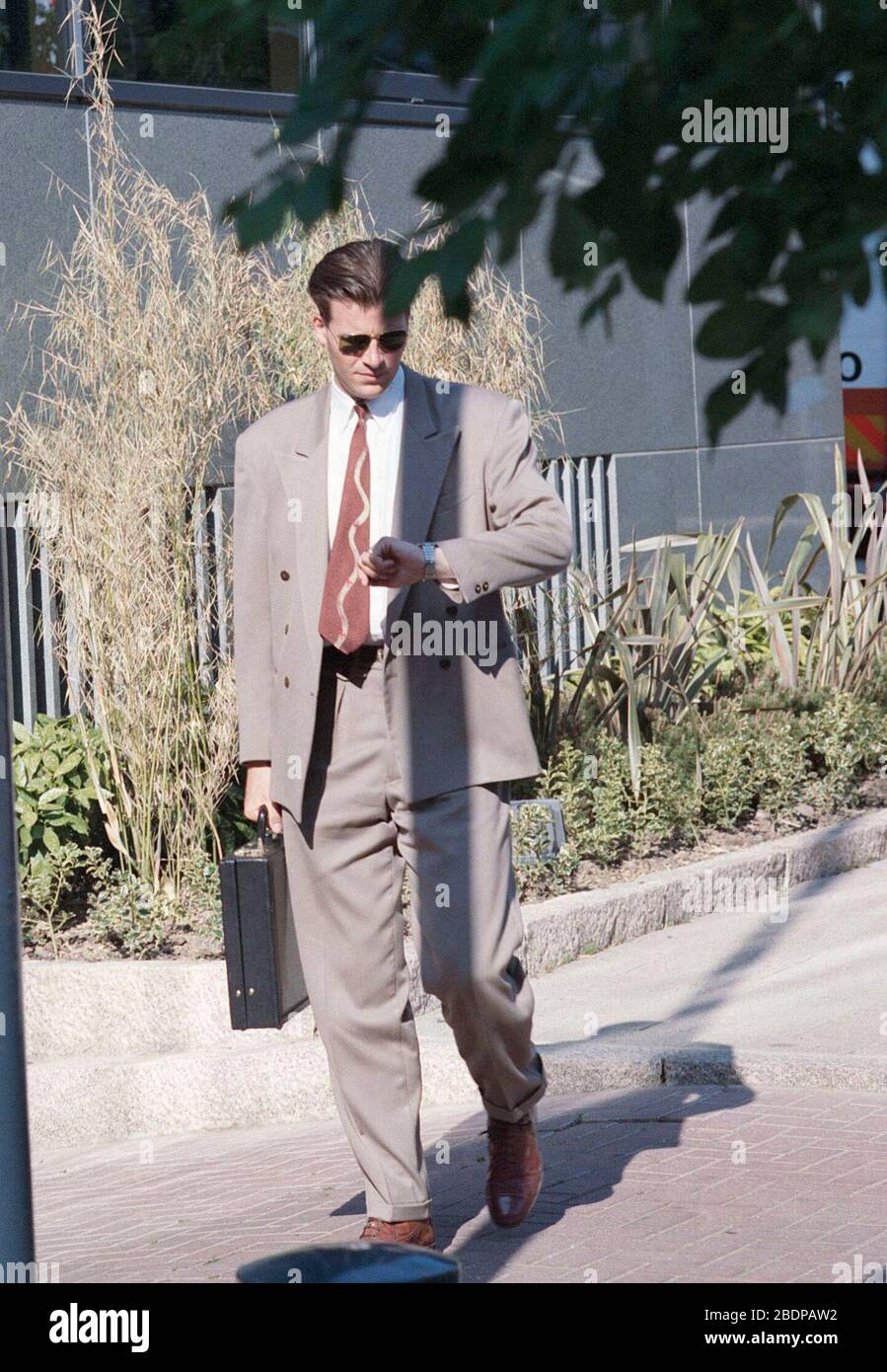 1990, smartly dressed office workers in the city of London, UK Stock ...