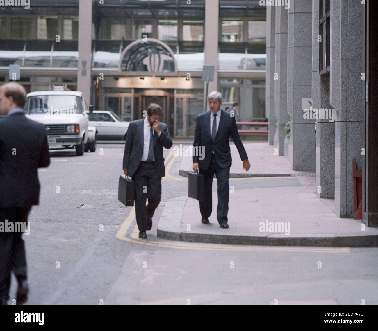 1990, smartly dressed office workers in the city of London, UK Stock ...