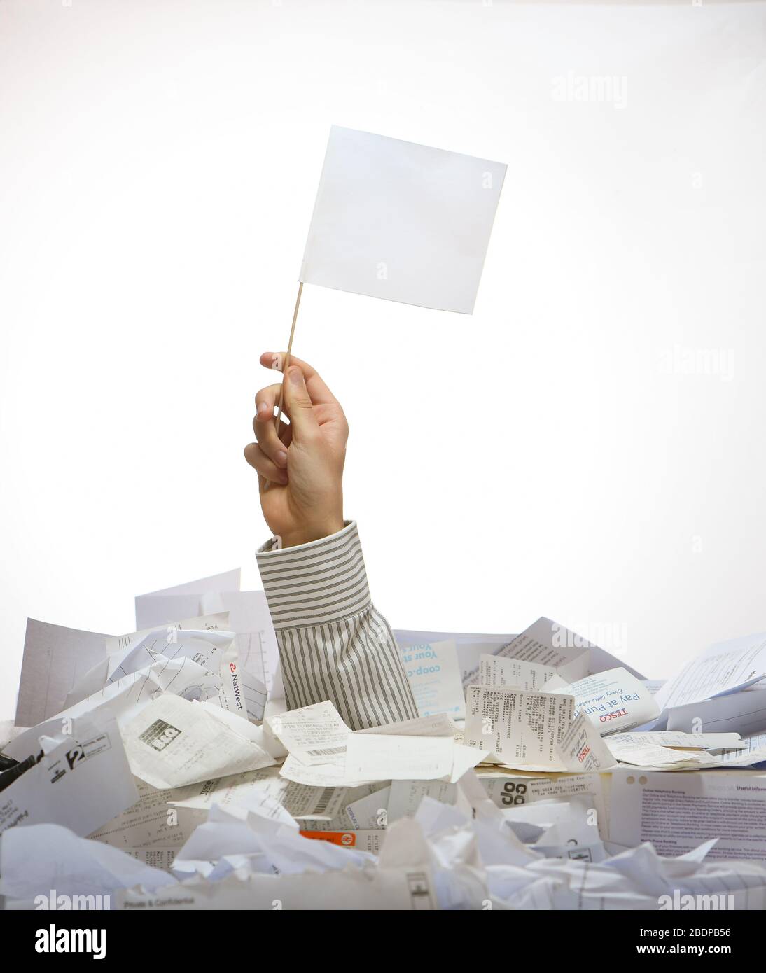 Concept image for business showing an arm reaching out of a pile of ...